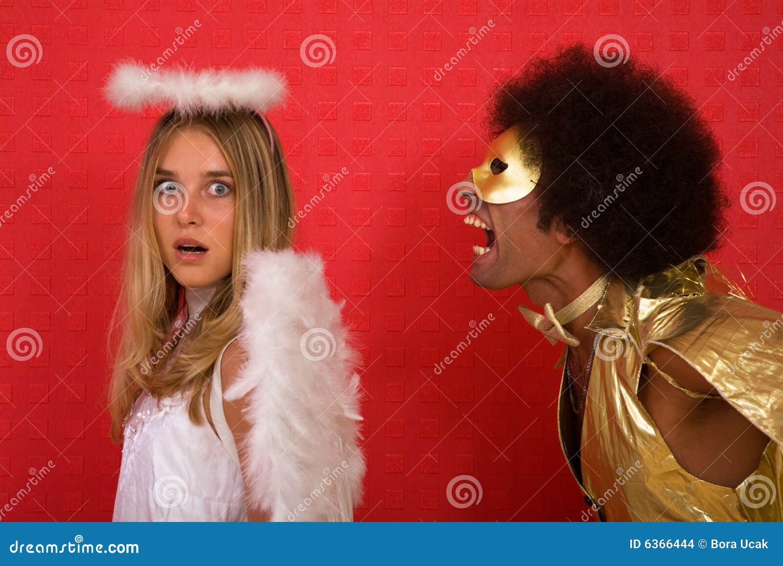 Ángel y diablo foto de archivo. Imagen de diablo, rivalidad - 6366444