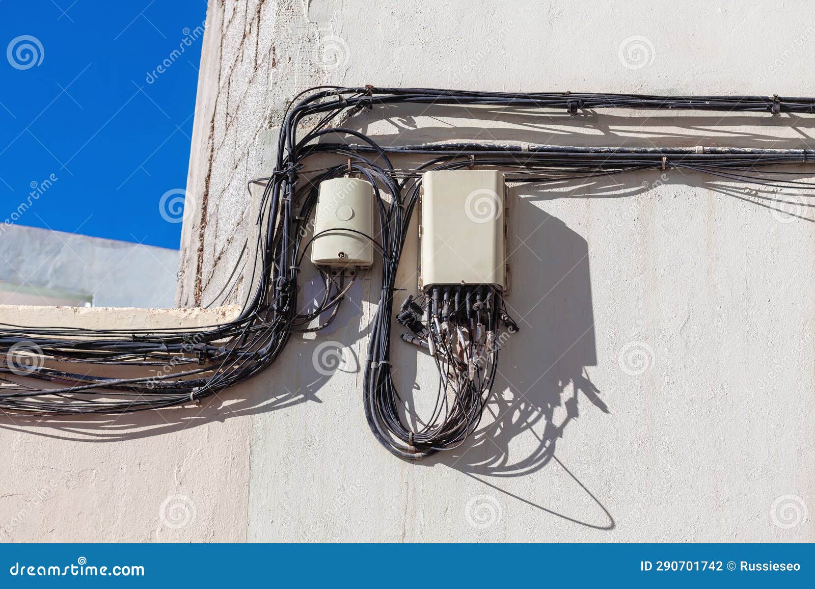 Wires on a white wall stock photo. Image of wall, rope - 290701742