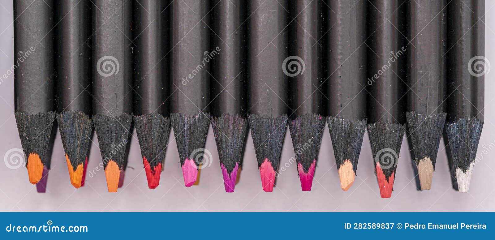 12 Black Colored Crayons Lined Up in Parallel with Slightly Different ...