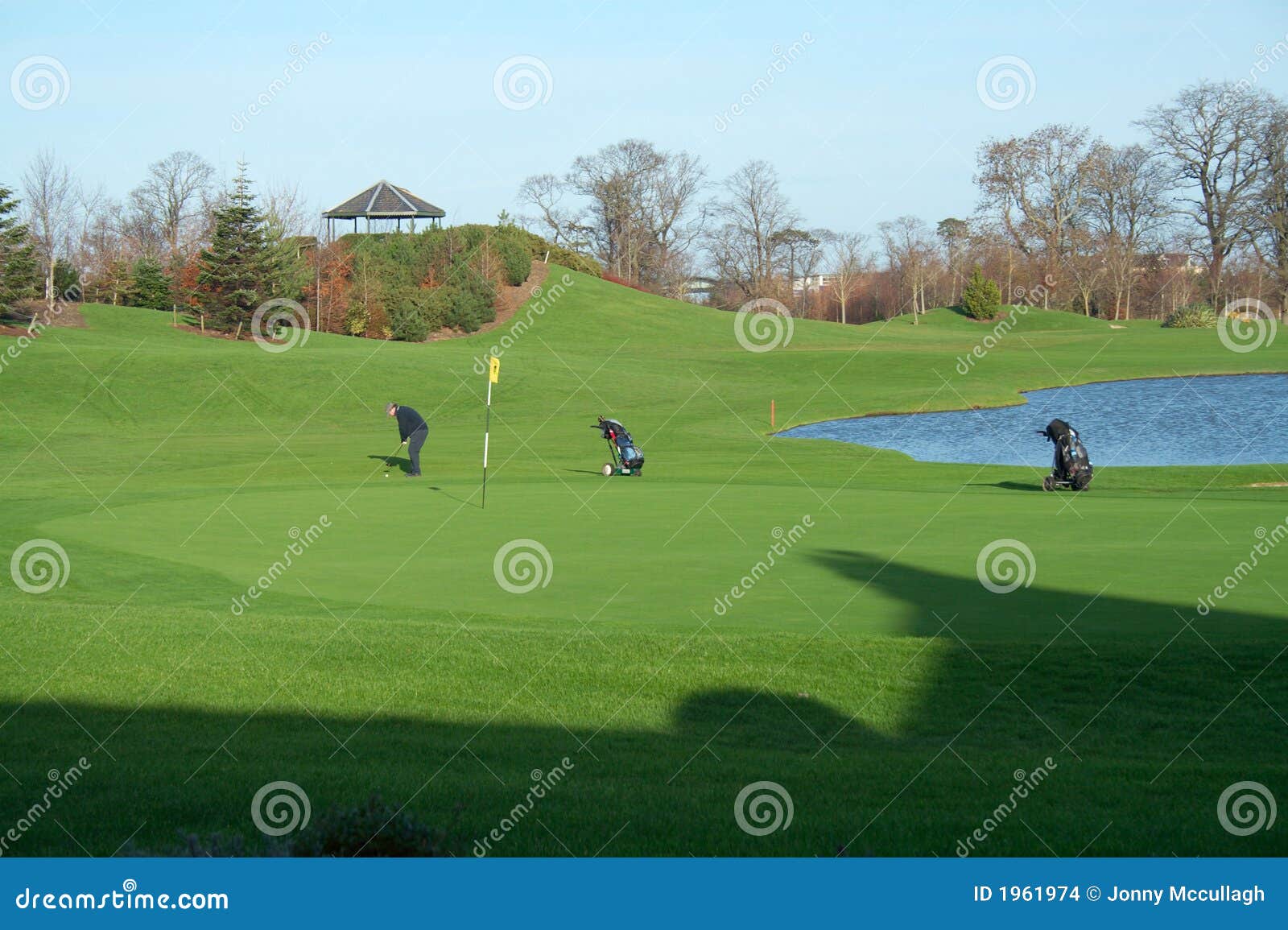 18th Hole stock photo. Image of executive, golfing, putting - 1961974
