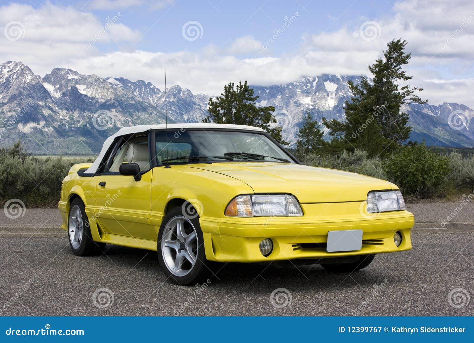 1991 Ford Mustang Convertible Yellow Stock Image - Image of clouds ...