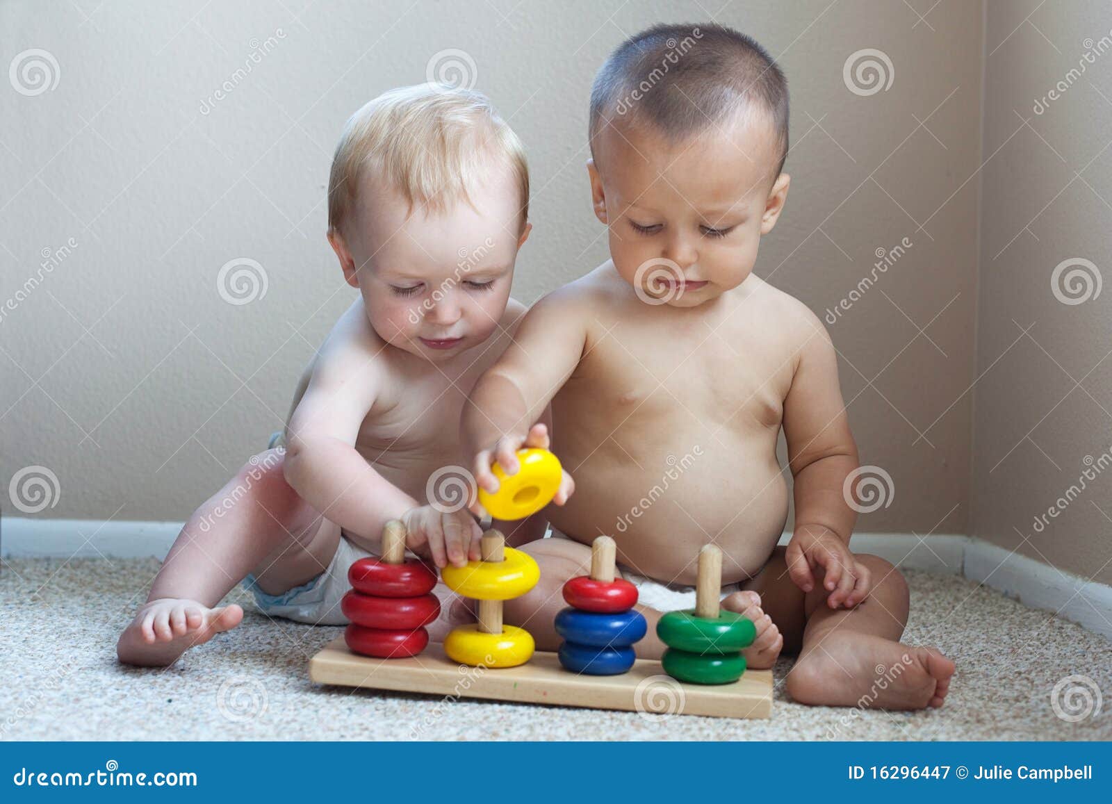 2 Babies Playing with Toys Inside Stock Image - Image of hispanic ...