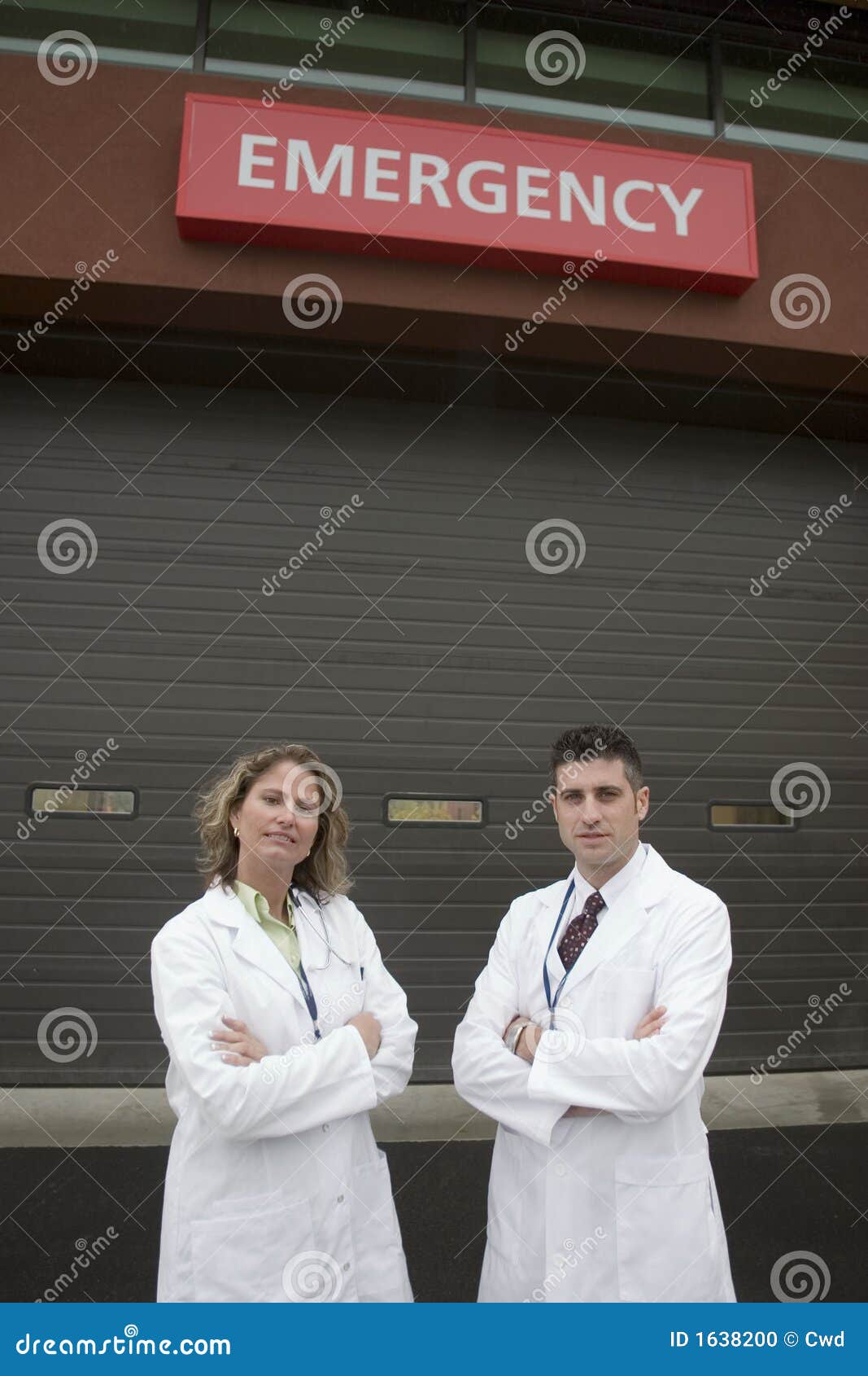 2 Doctors Outside of Hospital ER Stock Photo - Image of nurse, male ...