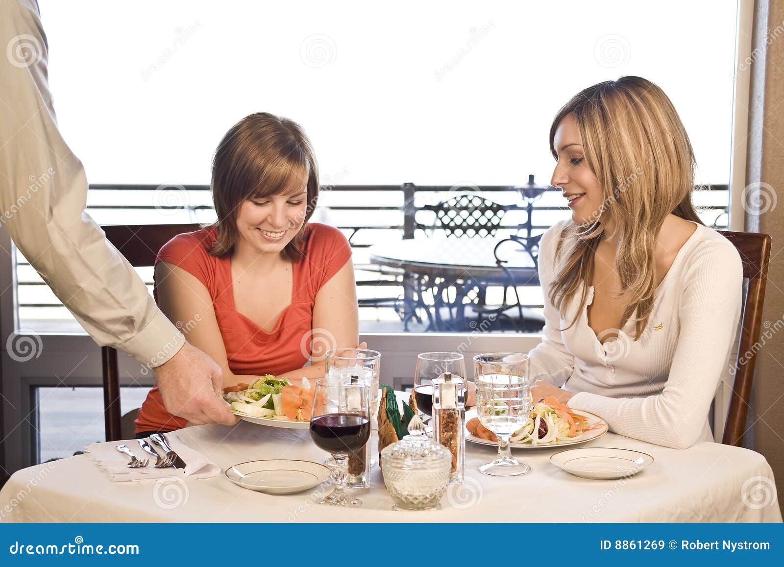 2 freinds having lunch stock image. Image of cocktails - 8861269