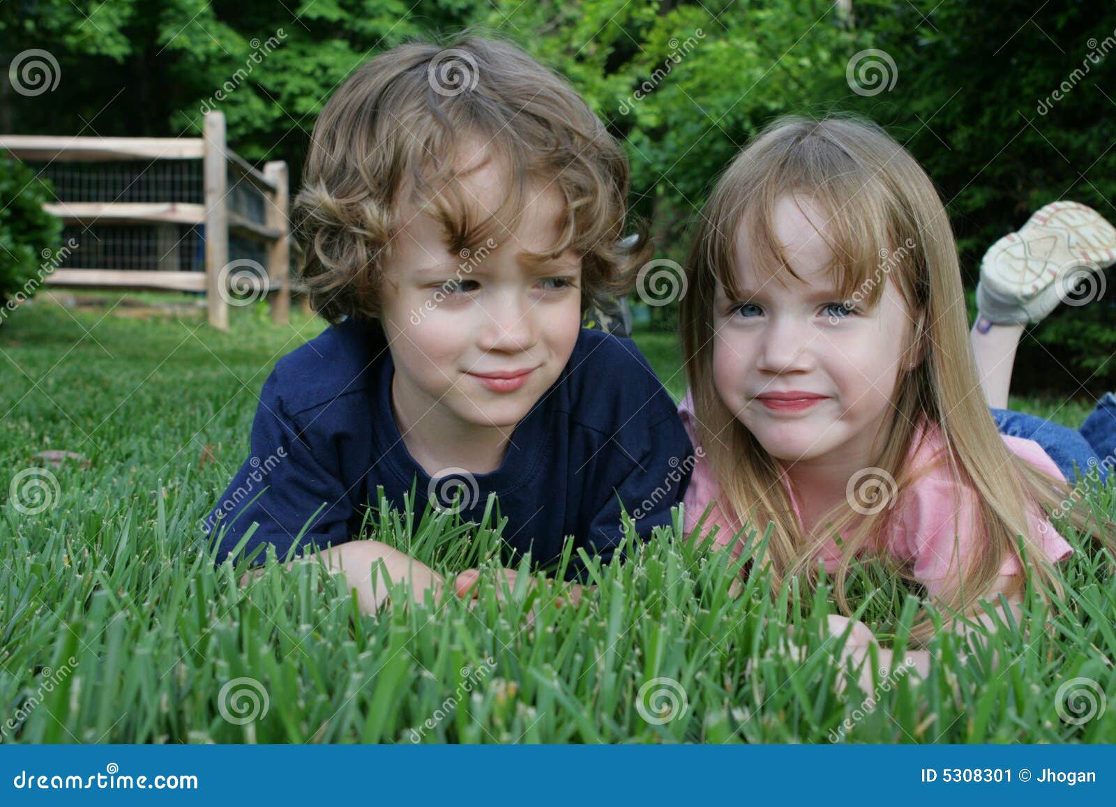 2 Kids In The Grass Picture. Image: 5308301