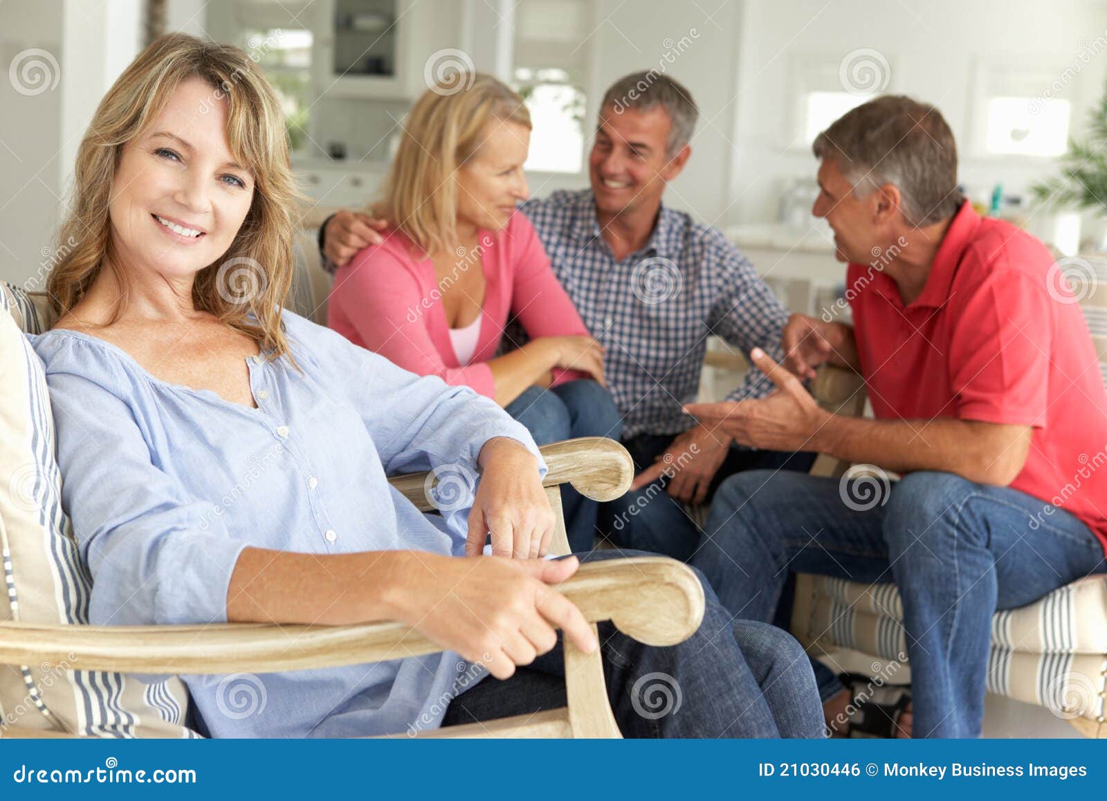 2 Mid Age Couples Socialising at Home Stock Photo - Image of couple ...