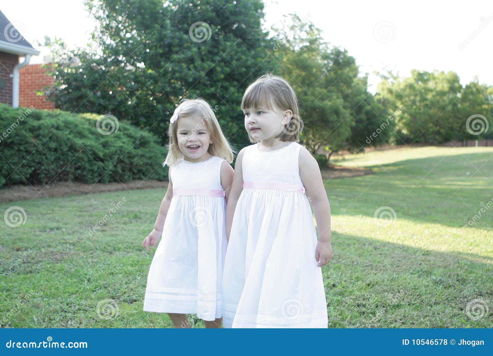 2 Sisters Enjoying the Outdoors Stock Photo - Image of cute, field ...