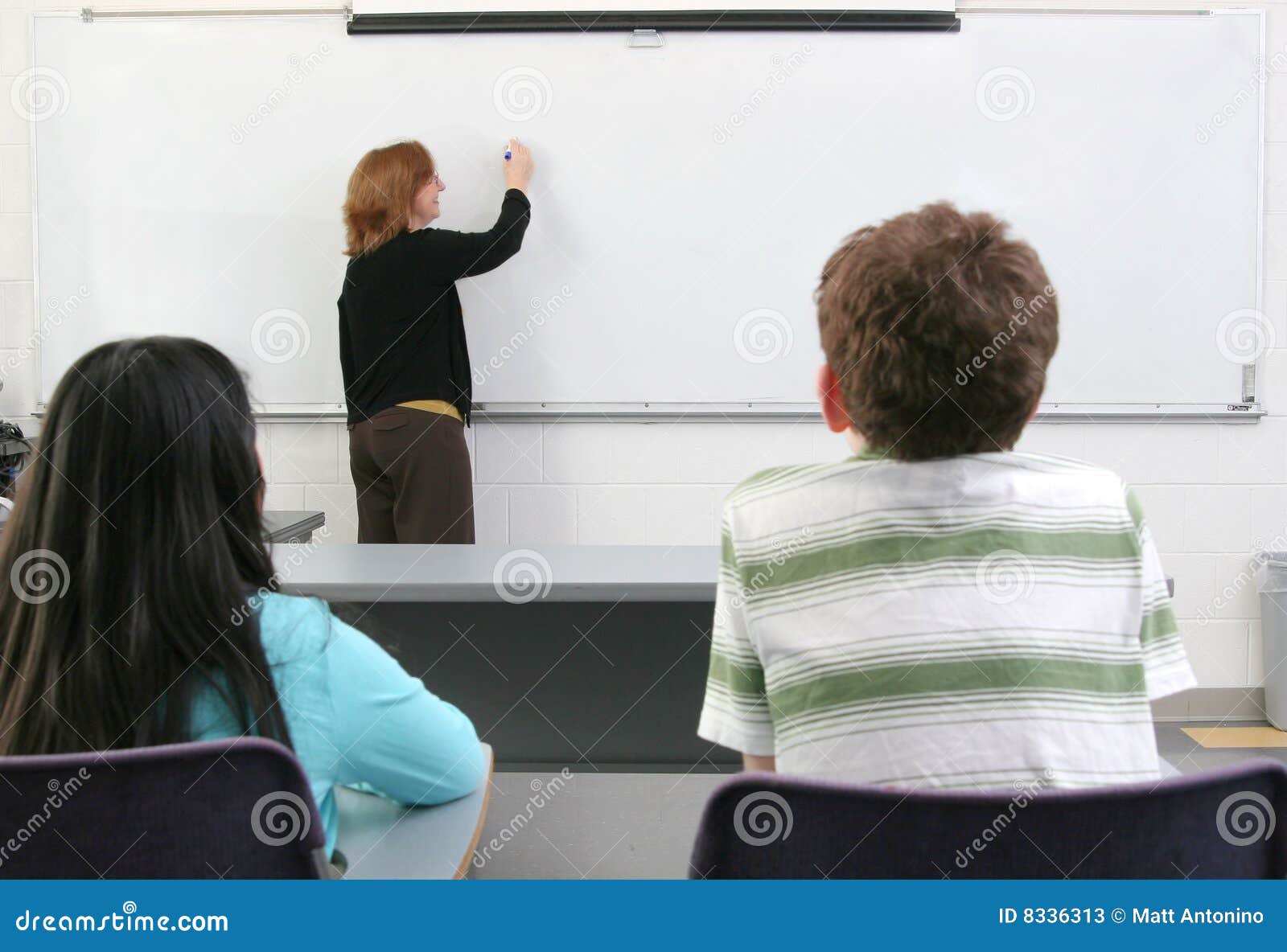 2 students and teacher stock image. Image of learning - 8336313