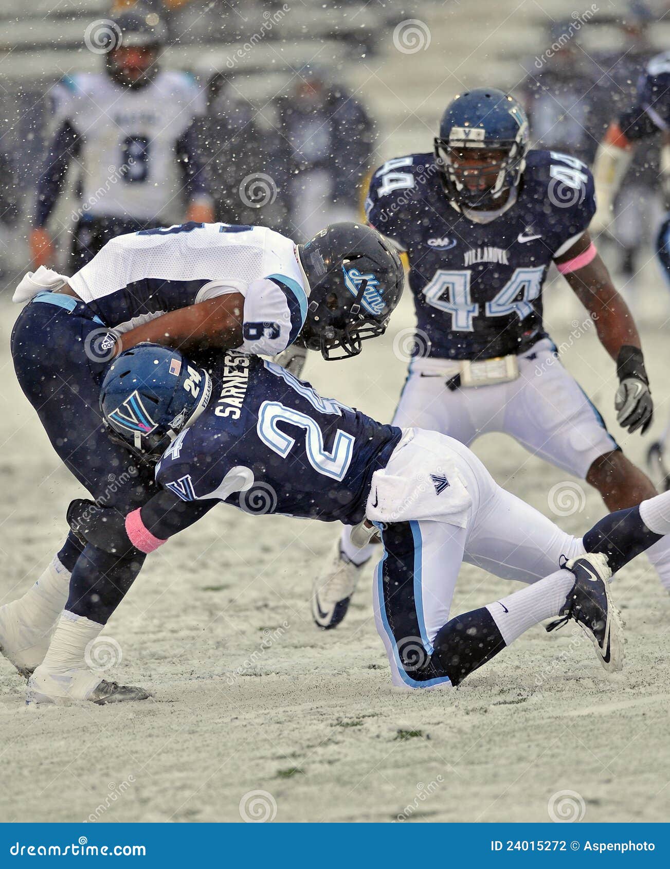 2011 NCAA Football - Tackle in the Snow Editorial Photography - Image ...