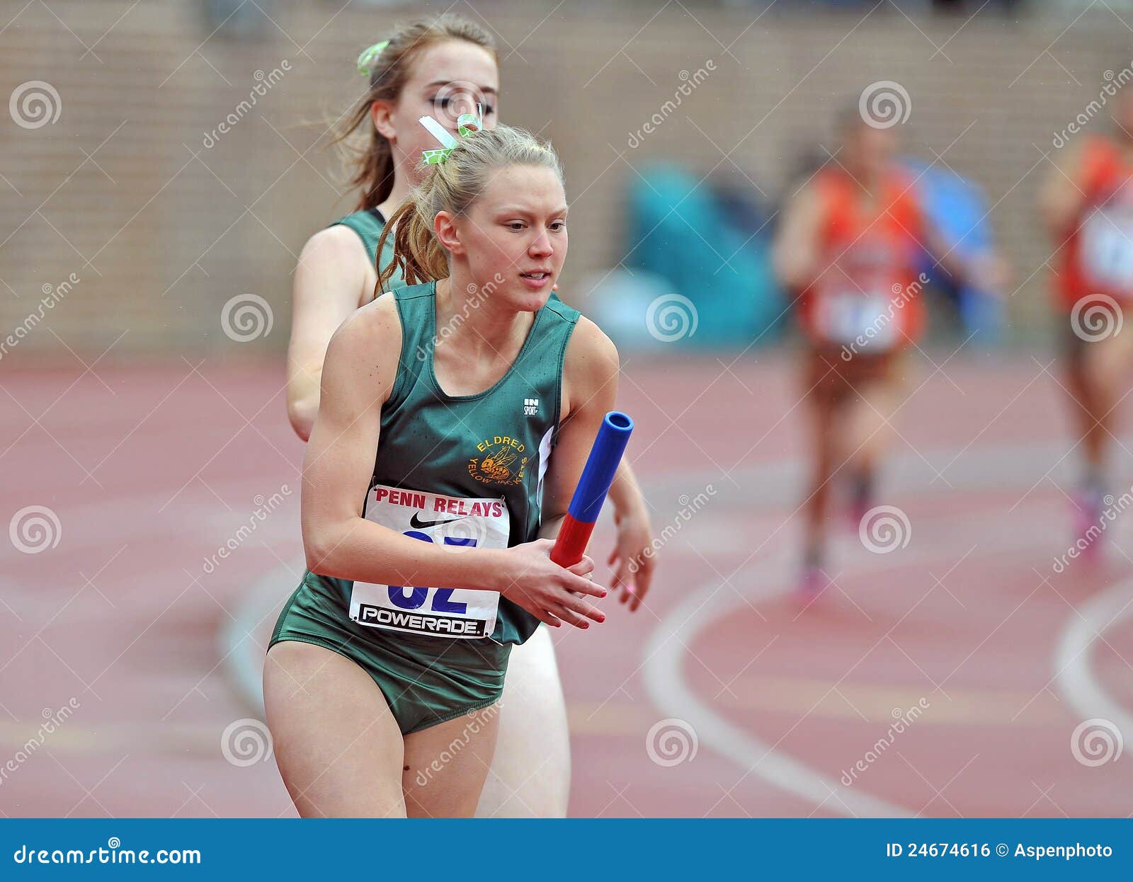 2012 Track - Female HS Relay Runner Editorial Photo - Image of teamwork ...