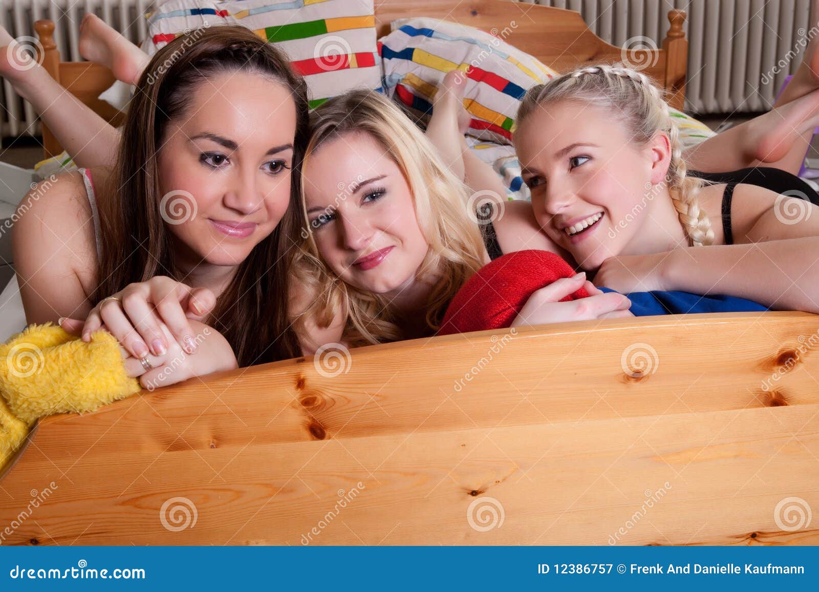 3 Adorable Girlfriends Cuddling in a Bed Stock Image - Image of bedroom ...