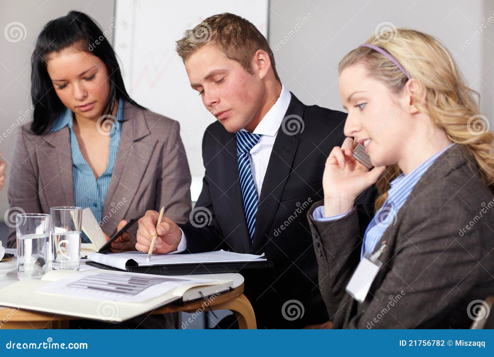 3 Business People Working on Some Calculations Stock Photo - Image of ...