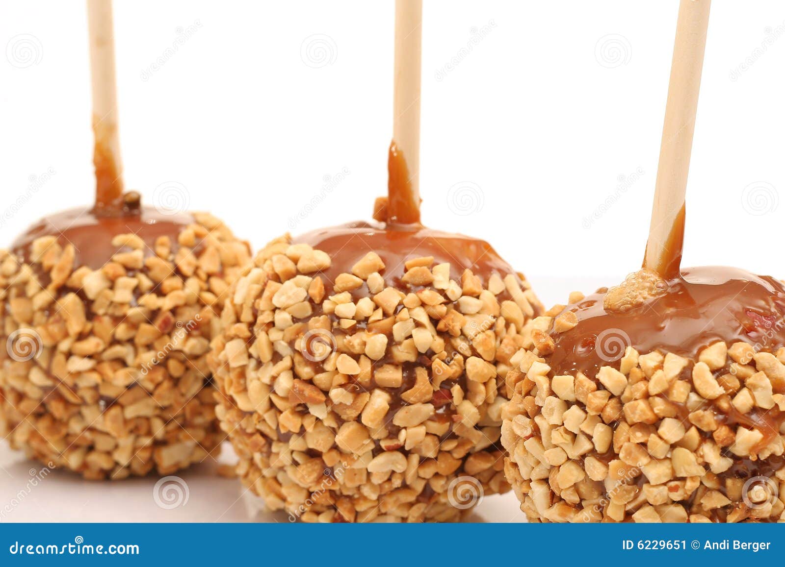 3 Caramel Apples W/peanuts of White Stock Image - Image of fruit, stick ...