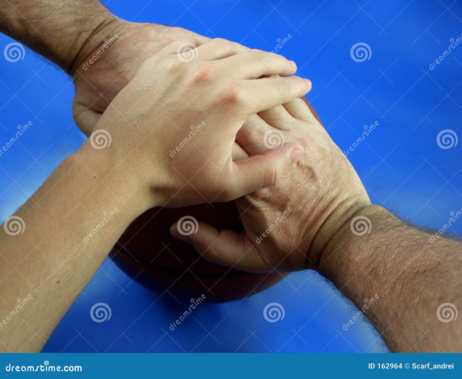 3 hands on a ball stock photo. Image of success, victory - 162964