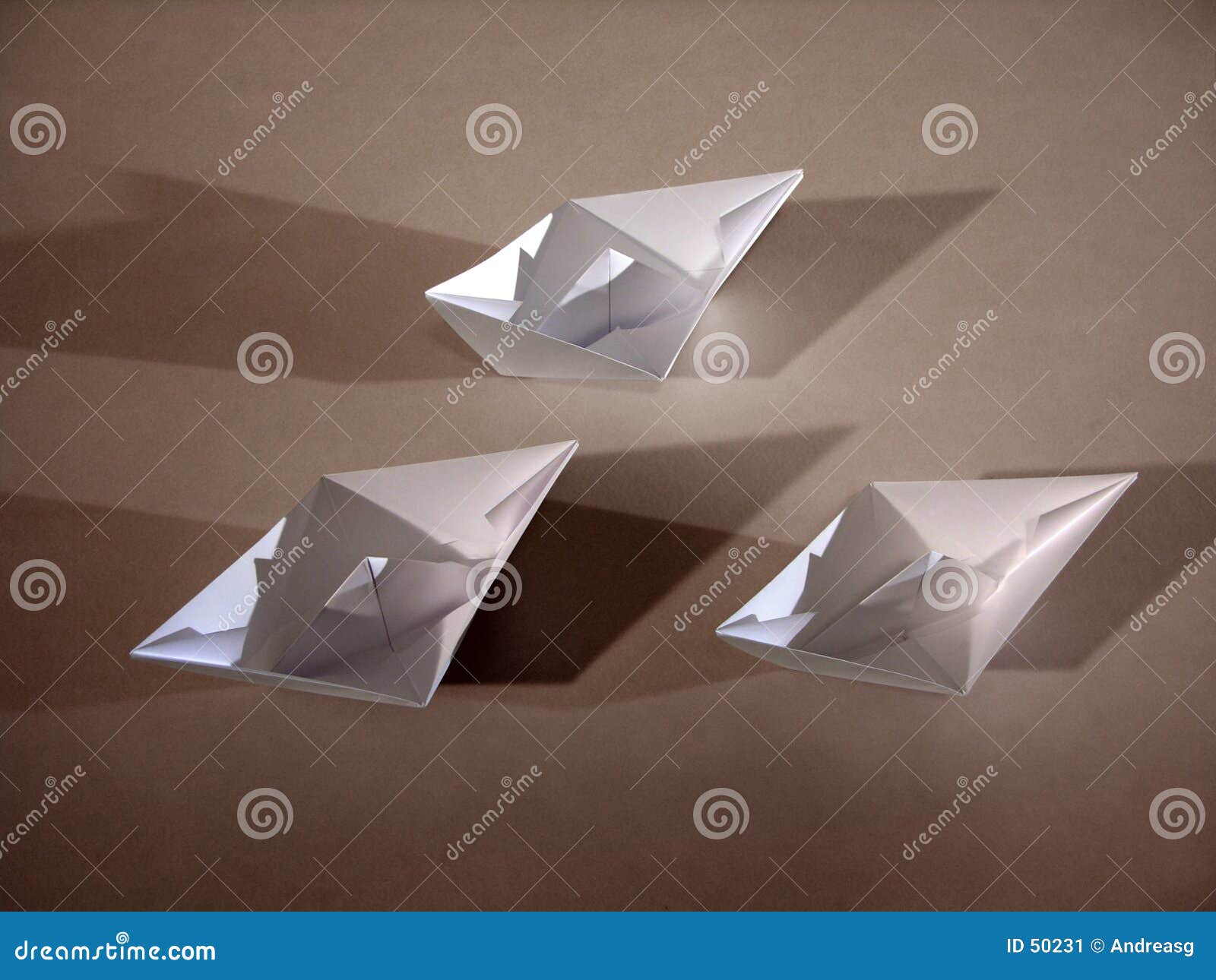3 paper boats on bronze stock image. Image of handmade, travel - 50231