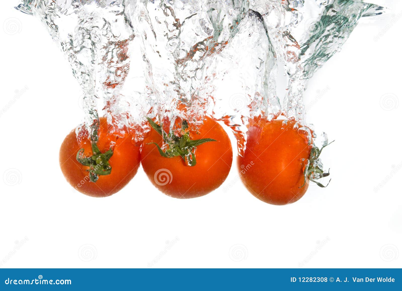 3 Tomatoes Falling in Water Stock Photo - Image of background, motion ...