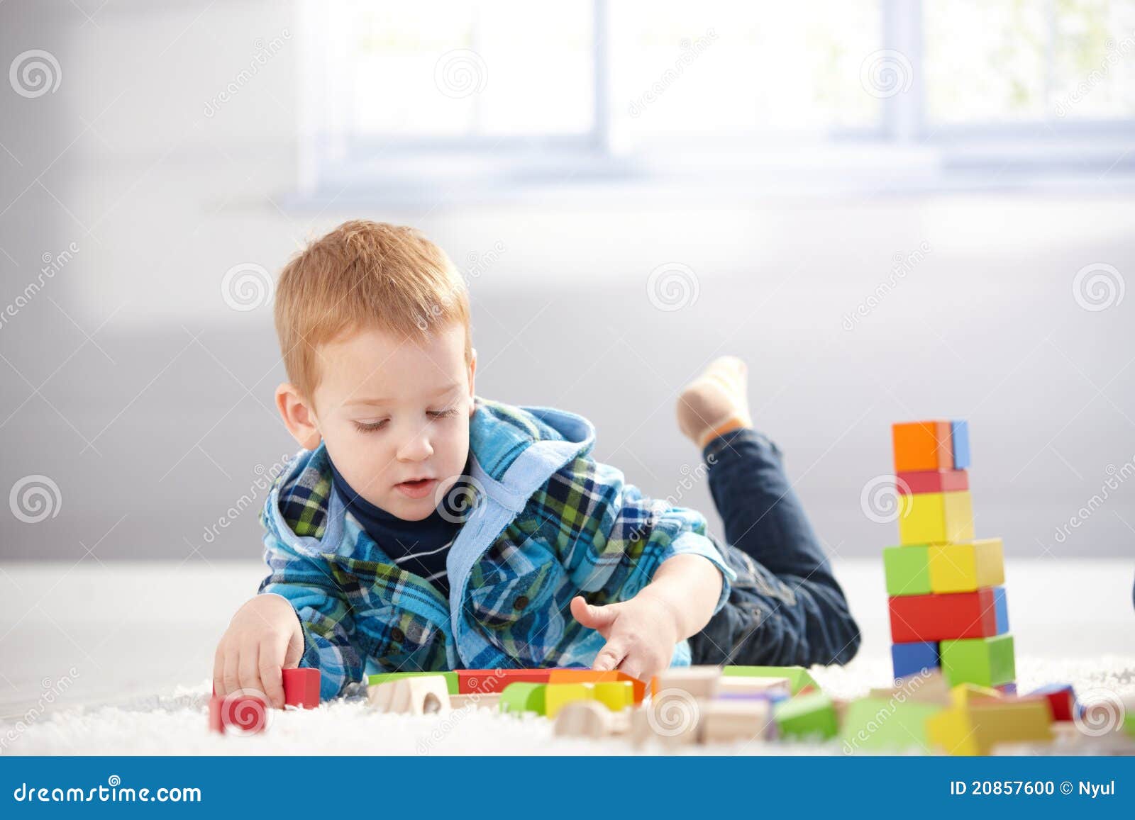 3 Year Old Playing with Cubes on Floor Stock Photo - Image of blue ...