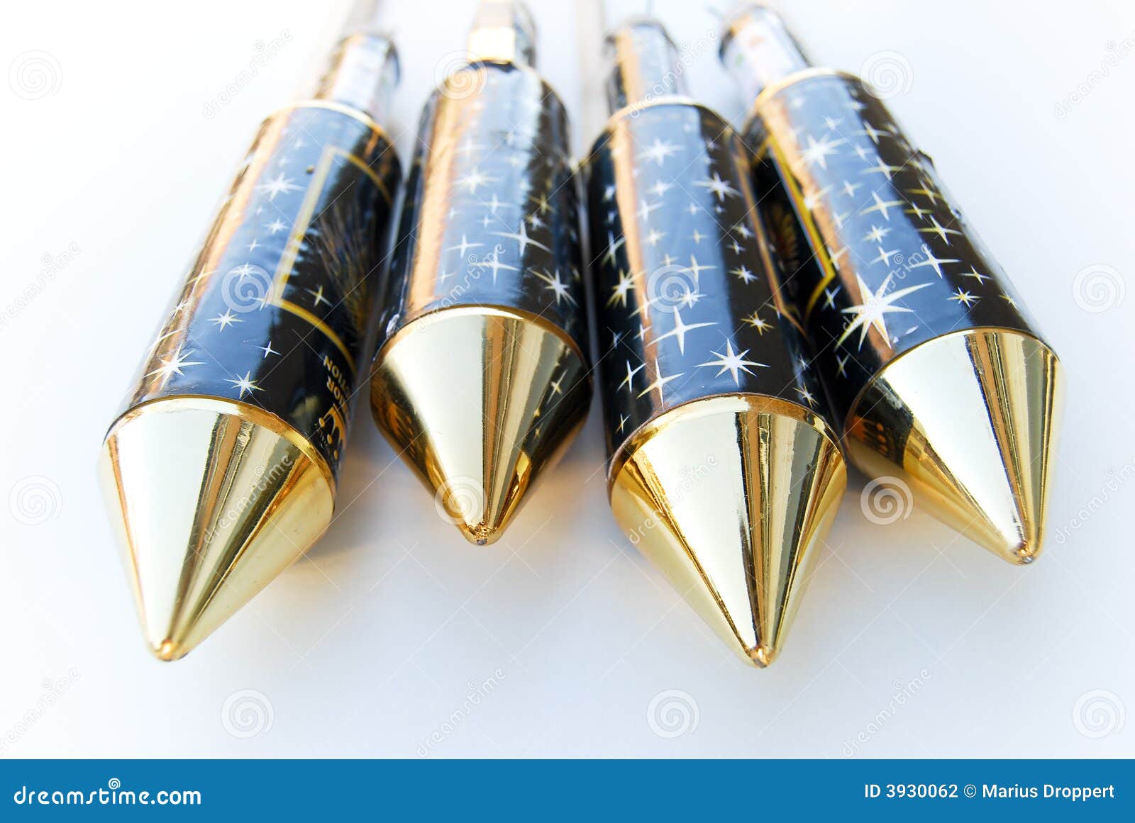 4 New Fireworks Rockets with Golden Top Stock Photo - Image of ...
