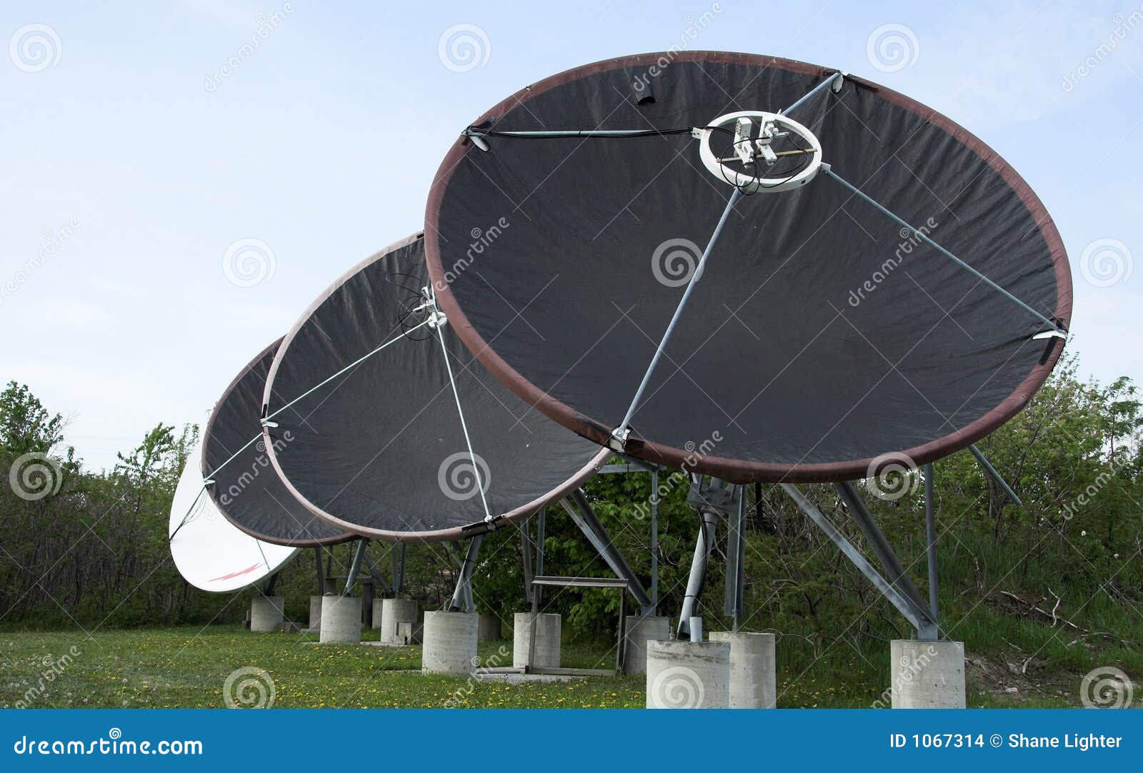 4 Satellite Dishes stock photo. Image of modern, defense - 1067314