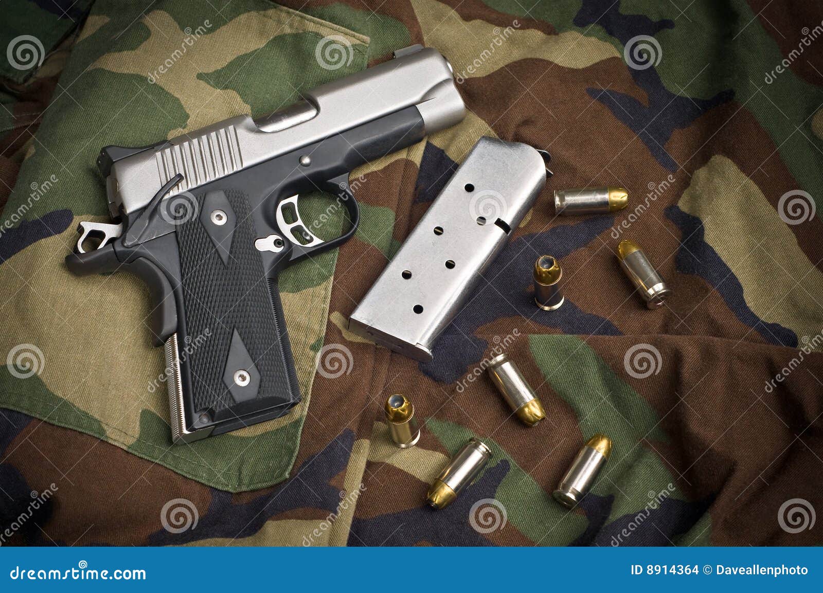 Firearm Pistol On Military Camouflage Background Stock Photo ...