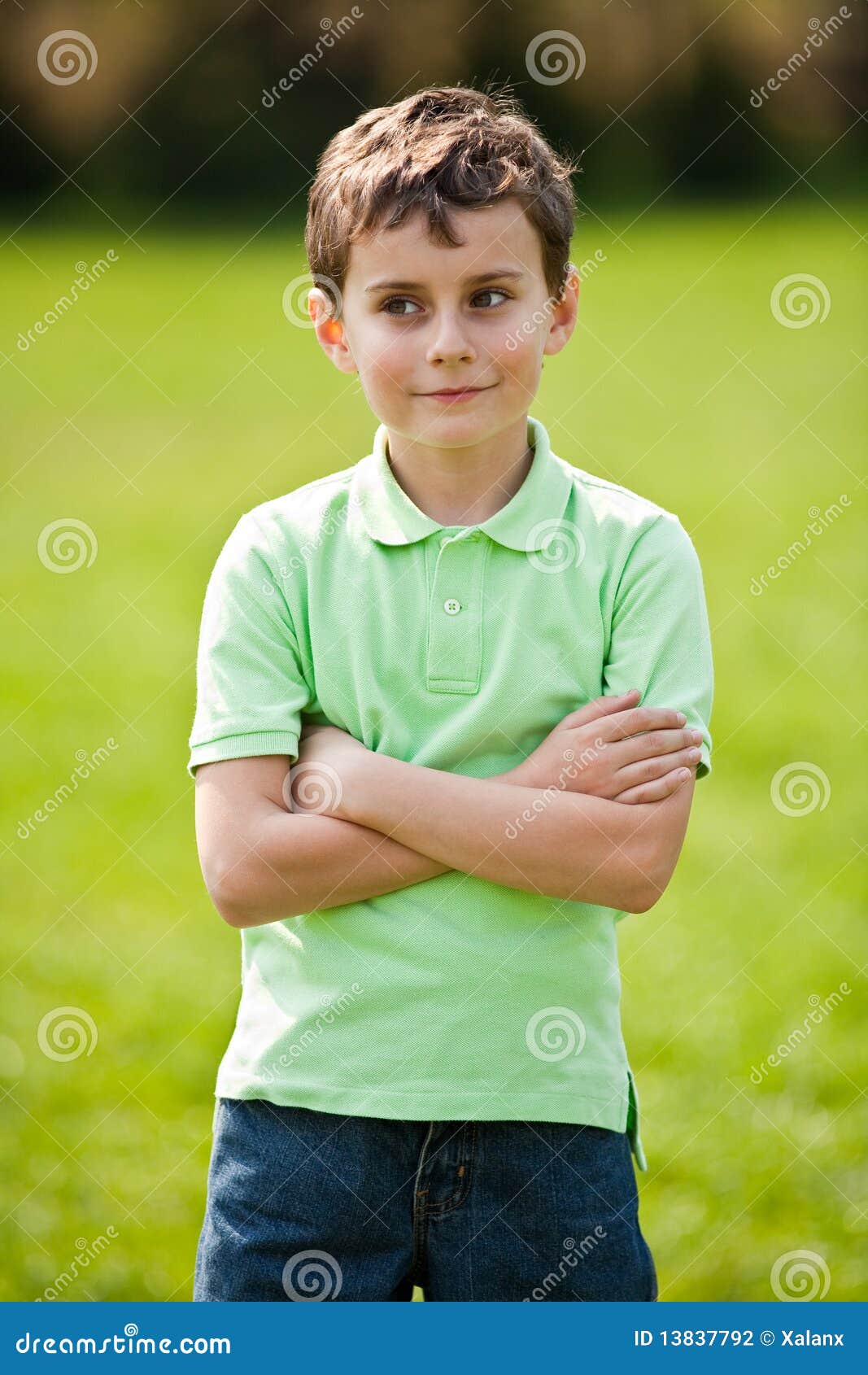 9 years old kid in a park stock photo. Image of arms - 13837792