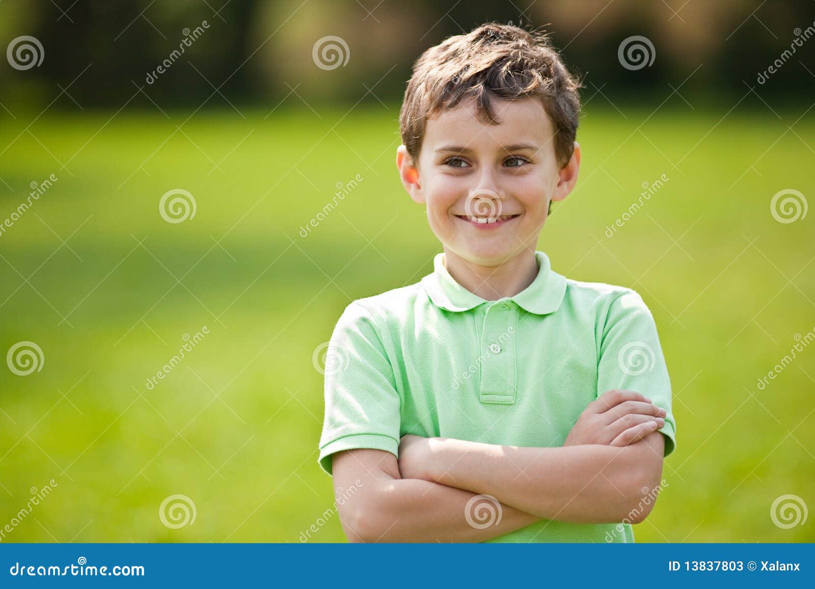 9 years old kid in a park stock image. Image of folded - 13837803