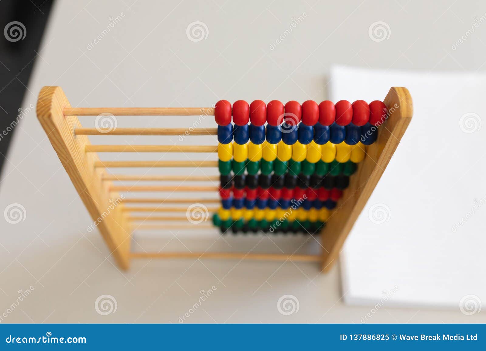 Abacus and Bunch of Paper on the Desk in School Stock Image - Image of ...