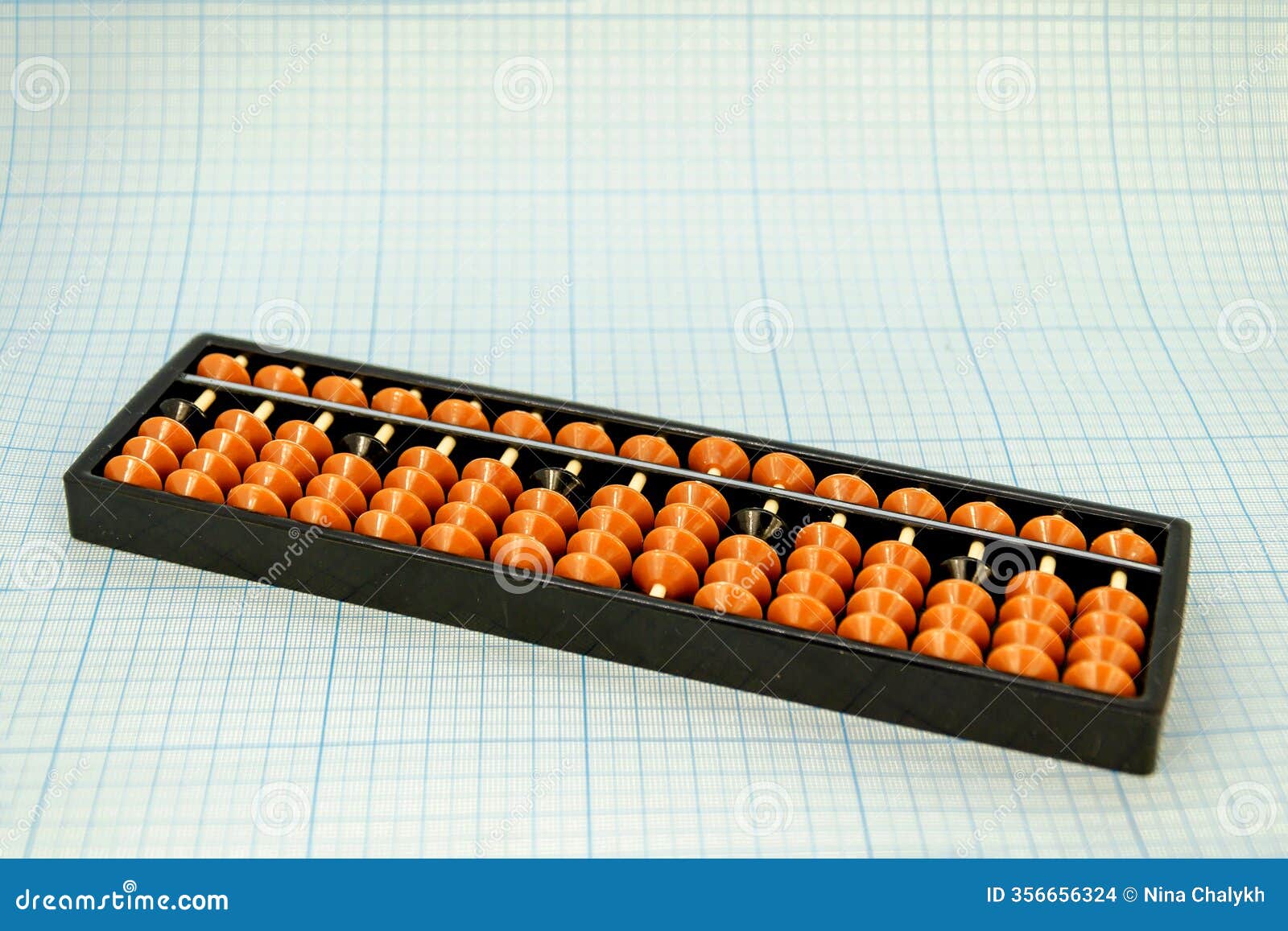 Abacus for Mental Arithmetic on Light Blue Checkered Background. Space ...