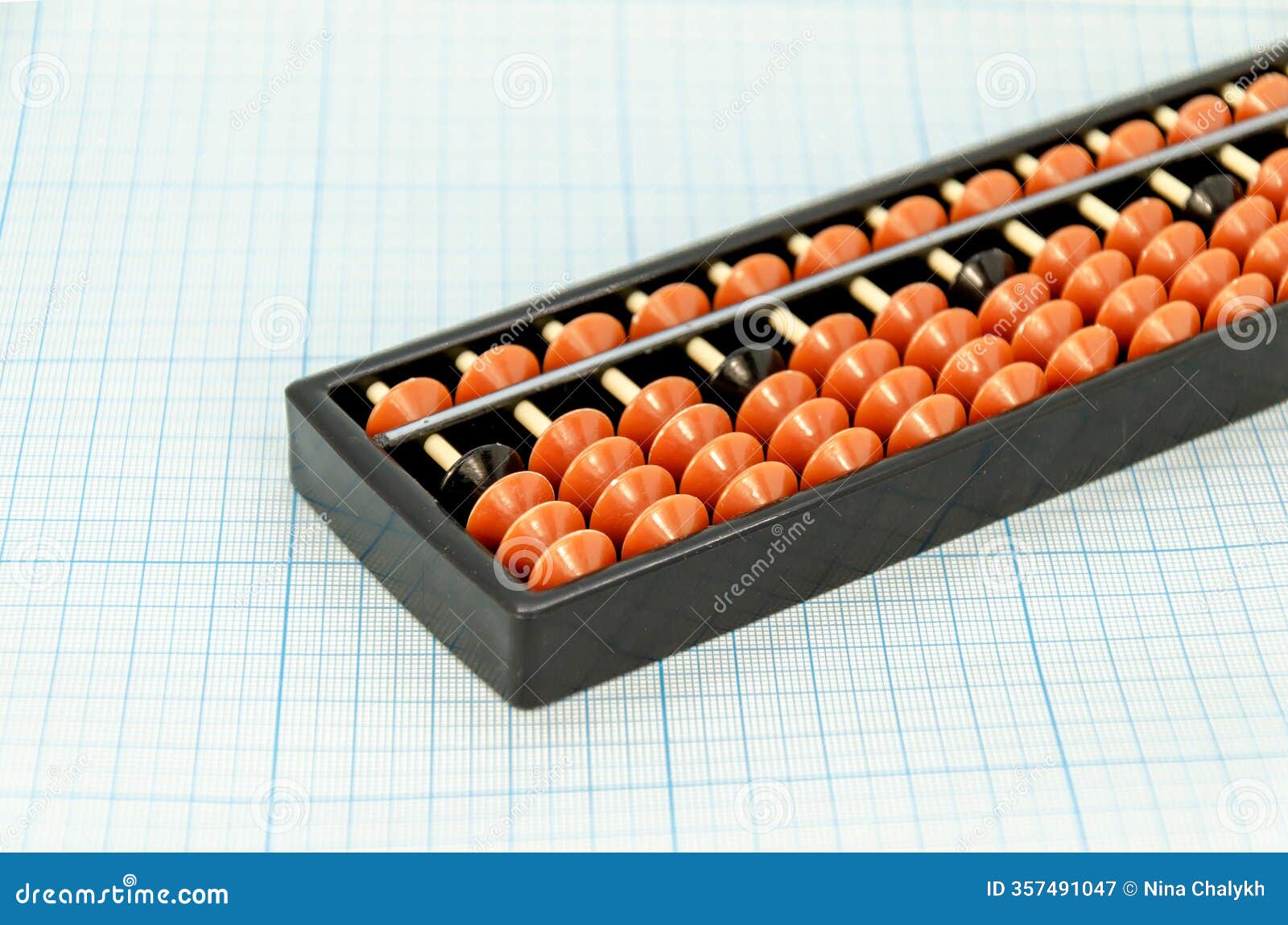 Abacus for Mental Arithmetic on Light Blue Checkered Background. Space ...