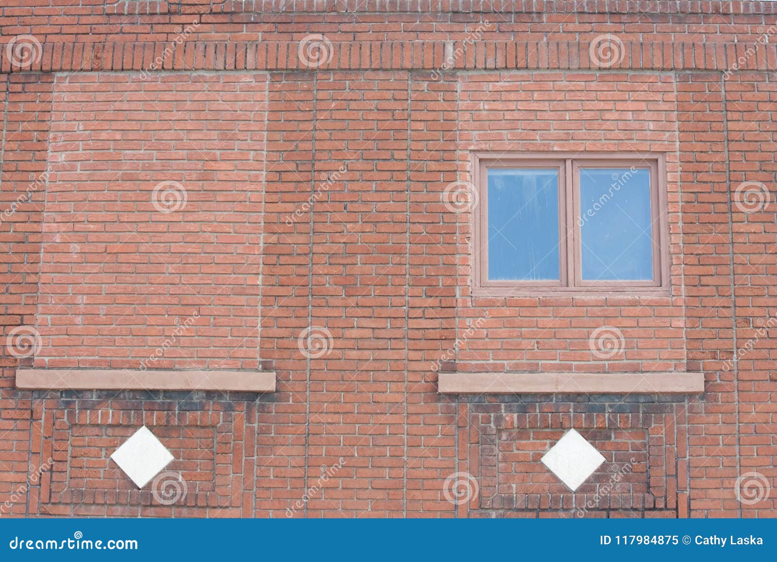 Brick Building with Windows and Diamonds Stock Image - Image of blue ...