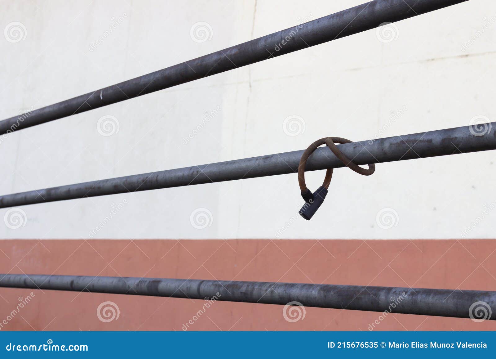 Abandoned and Closed Bicycle Key Lock on the Handrail of a Fence Stock ...