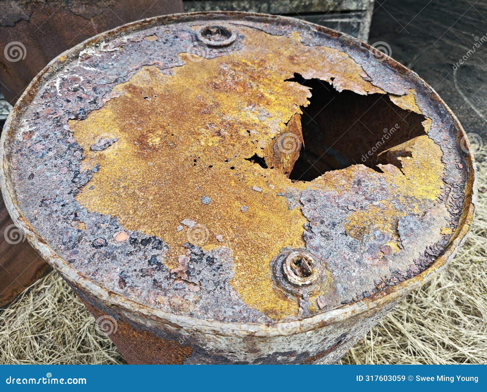 Abandoned Empty and Rusty Metal Barrel Left at the Junkyard. Stock ...
