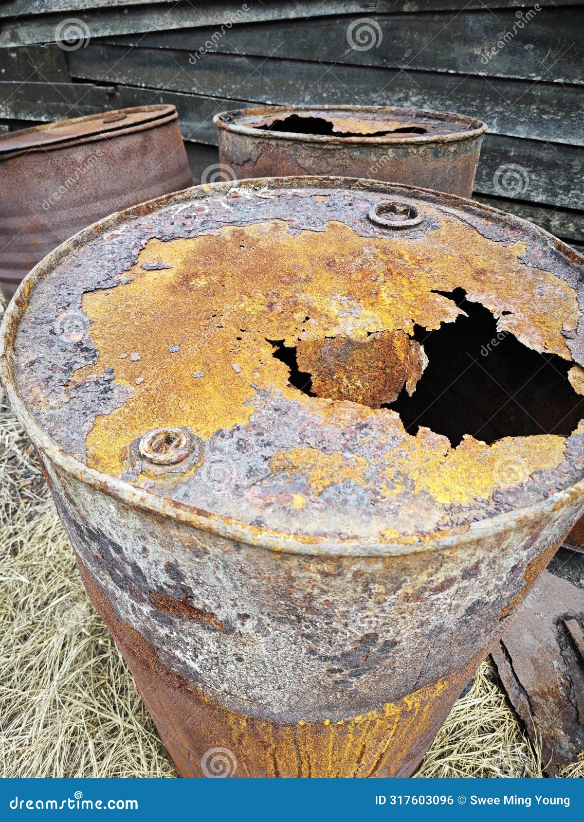 Abandoned Empty and Rusty Metal Barrel Left at the Junkyard. Stock ...