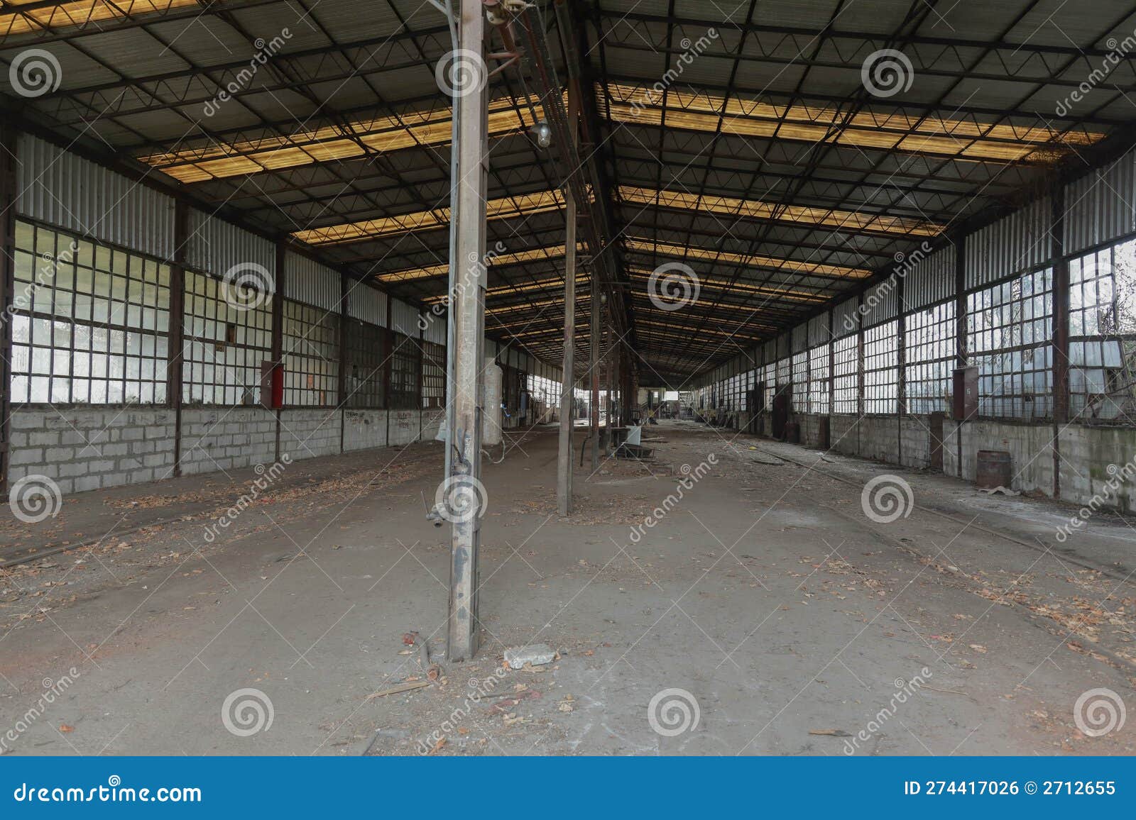 Abandoned empty warehouse stock photo. Image of construction - 274417026