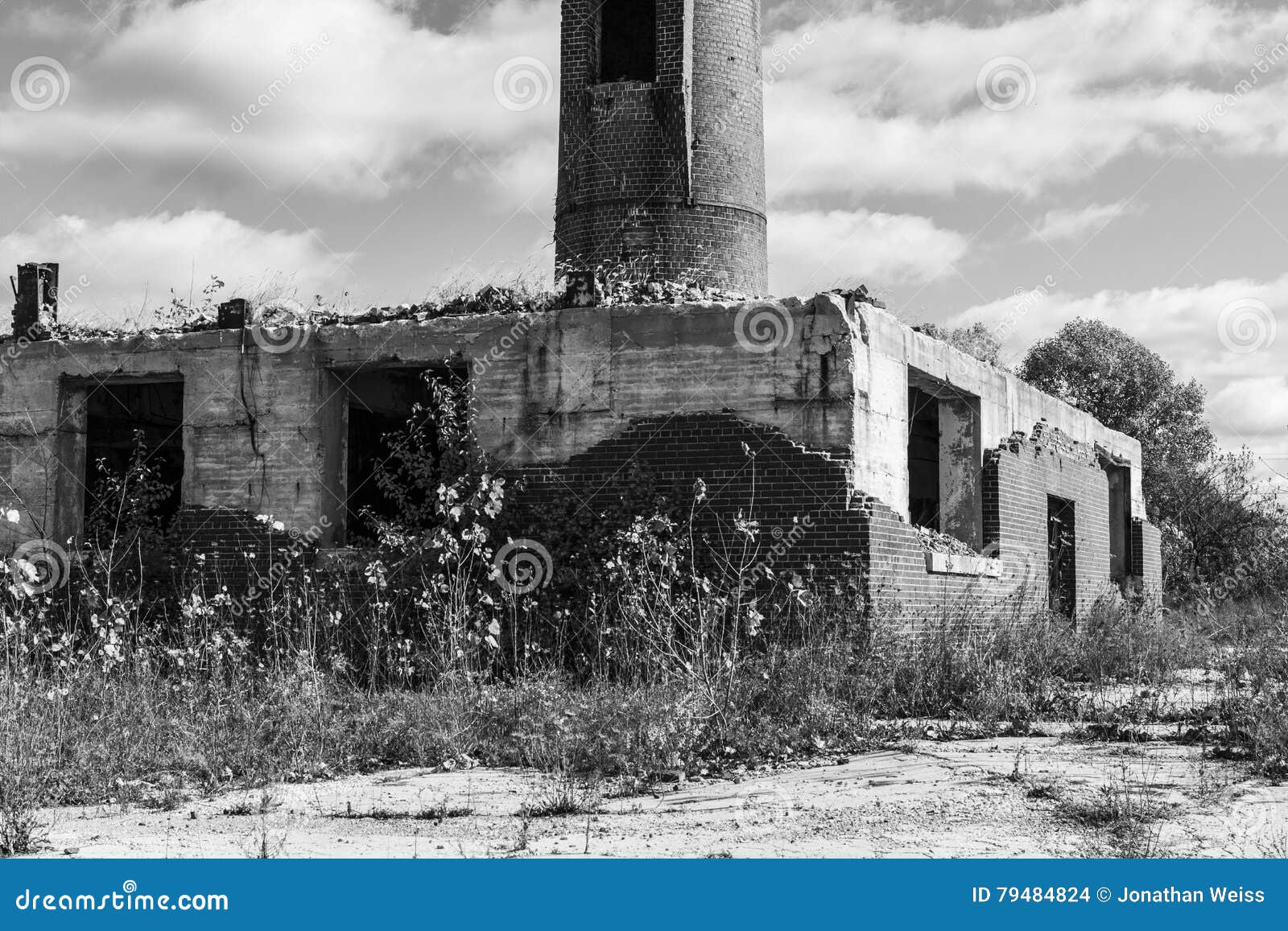 Abandoned Factory with Brick Smokestack and the Remnants of the Power ... Abandoned Factory with Brick Smokestack and the Remnants of the Power ...