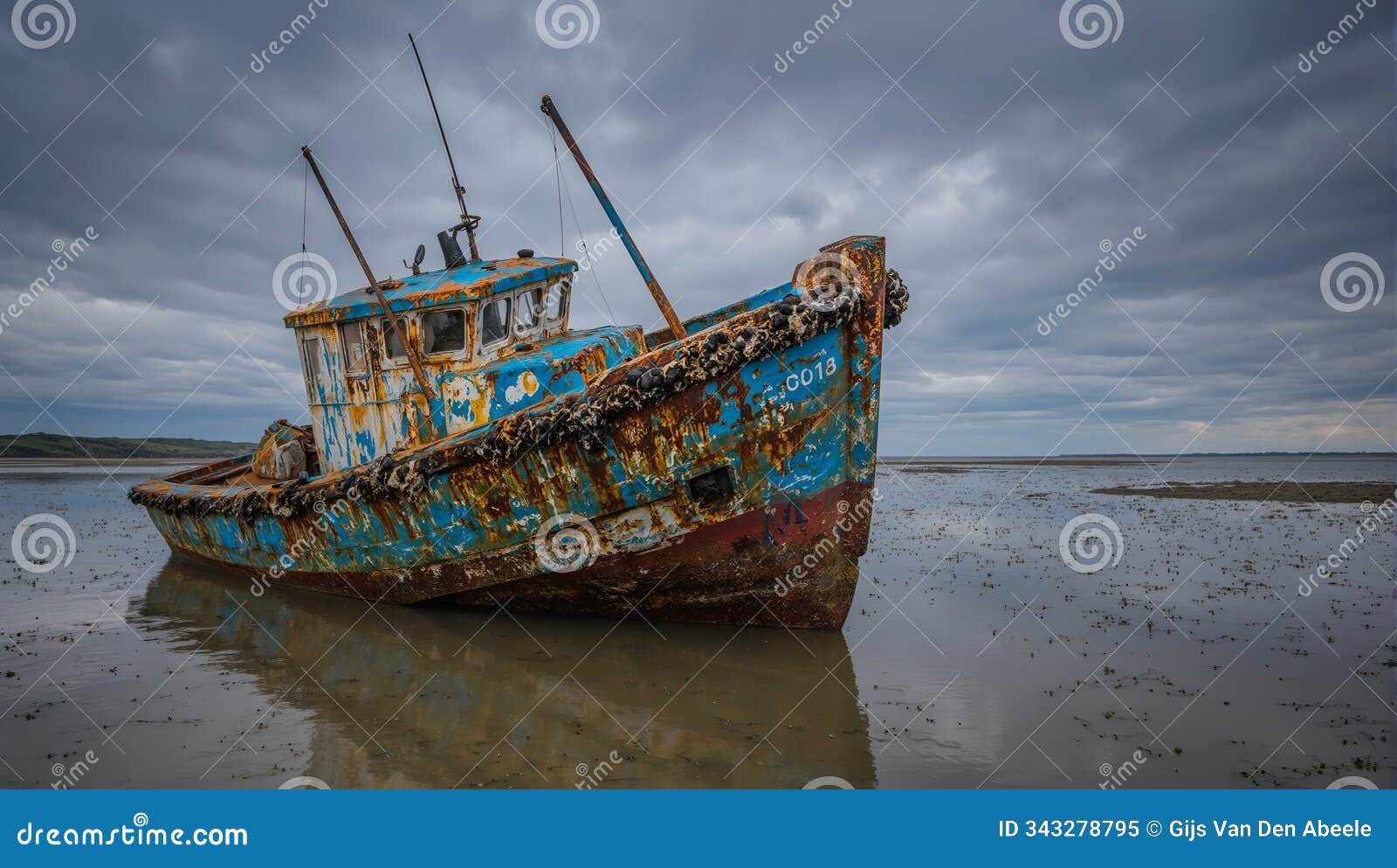 Abandoned Fishing Boat Covered In Rust And Barnacles Sunk In Muddy Bay ...