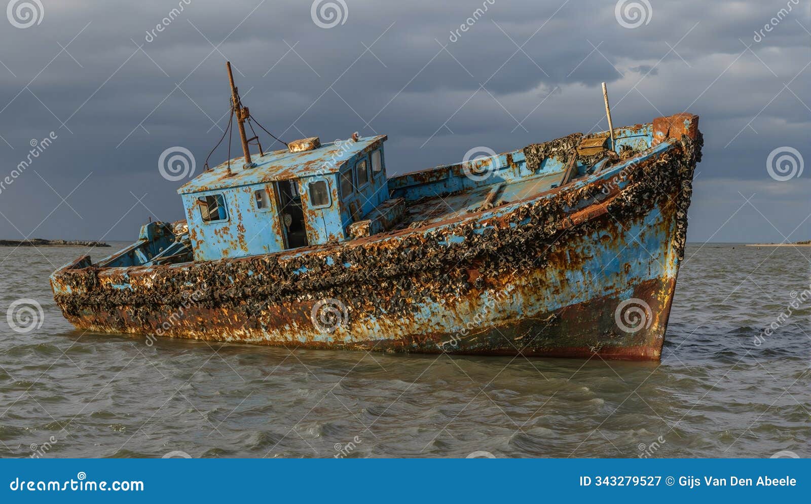 Abandoned Fishing Boat Covered In Rust And Barnacles Sunk In Muddy Bay ...