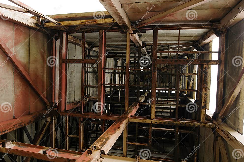 Abandoned Industrial Structure with Rusty Framework and Exposed ...