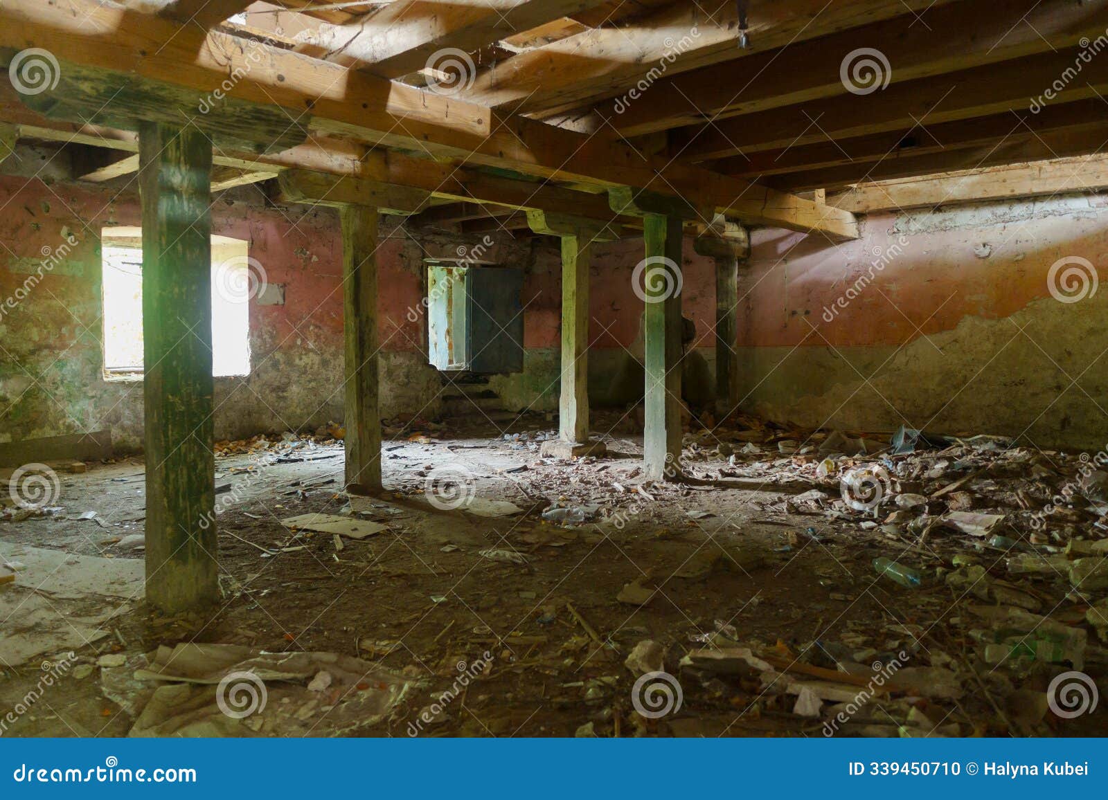 Abandoned Interior of a Dilapidated Building with Mossy Pillars and ...