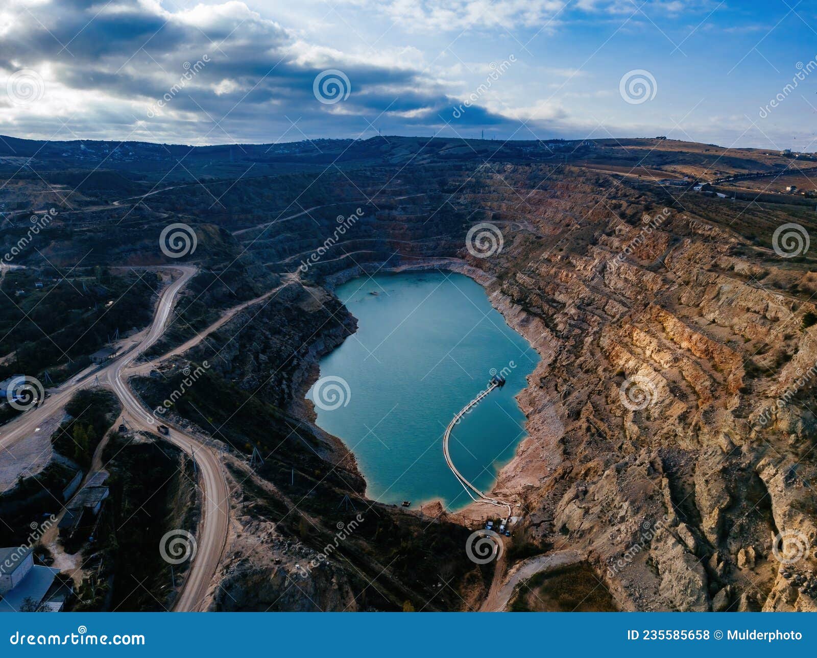 Abandoned Limestone Quarry with Lake at the Bottom Stock Photo - Image ...