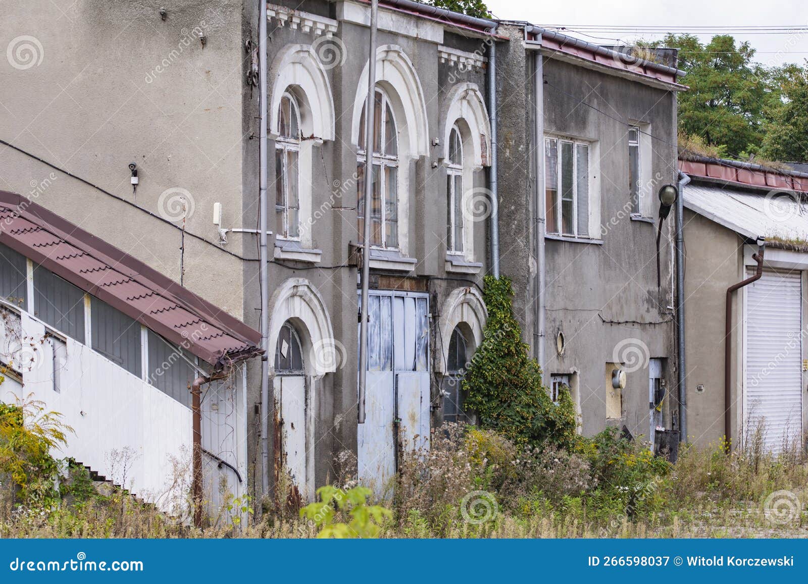 Abandoned and Neglected Building Under a Blue Sky on a Sunny Day ...