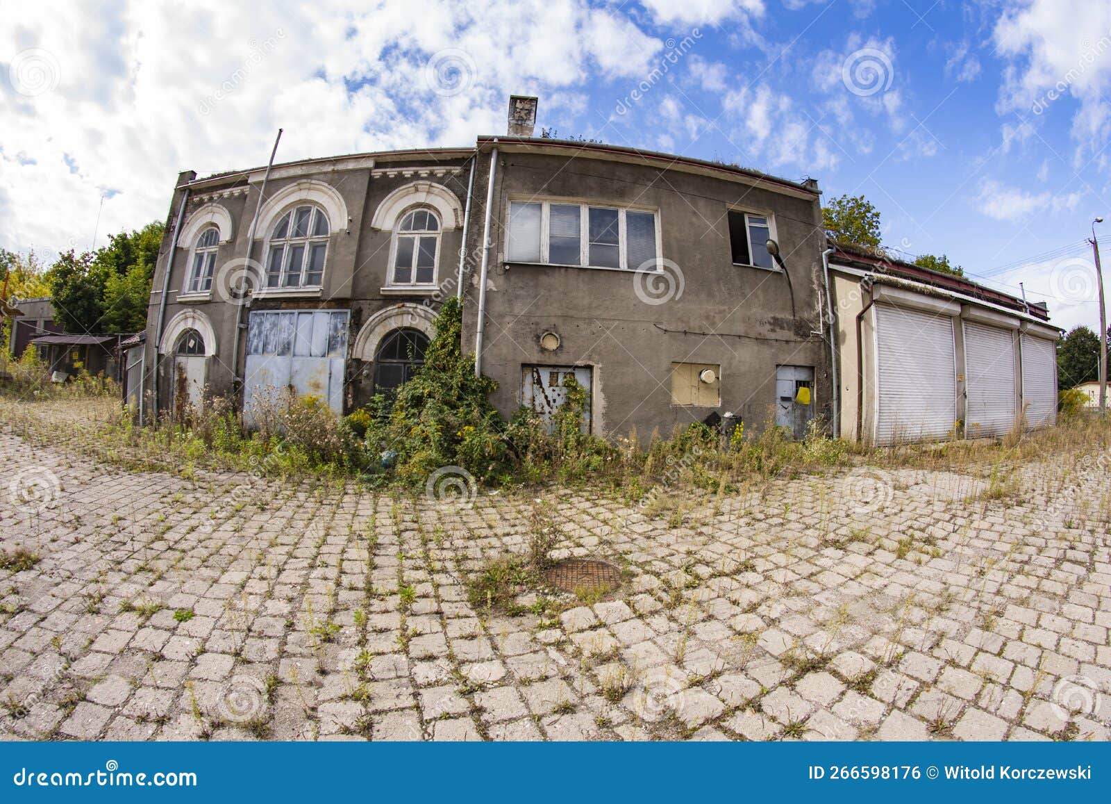 Abandoned and Neglected Building Under a Blue Sky on a Sunny Day ...