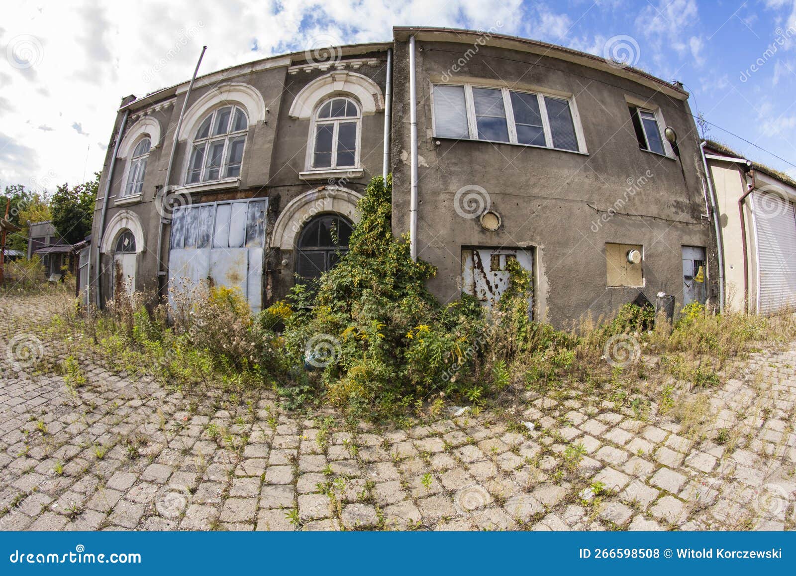 Abandoned and Neglected Building Under a Blue Sky on a Sunny Day ...