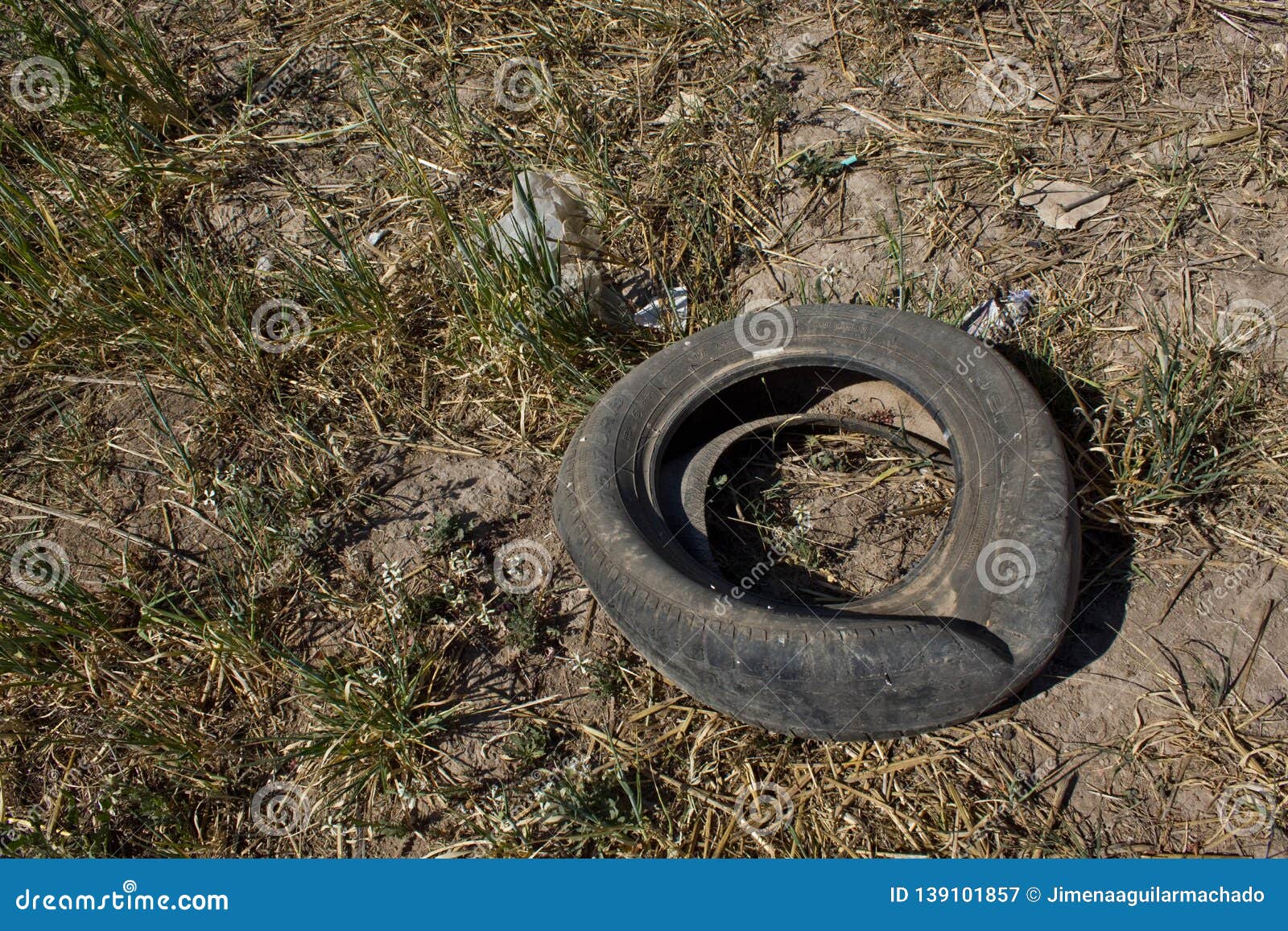 Abandoned Old Tire in a Empty Lote Stock Image - Image of tyre ...