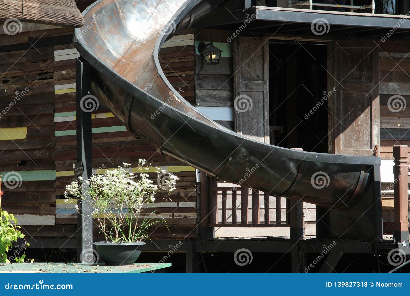 Water slide in the park stock photo. Image of decor - 139827318