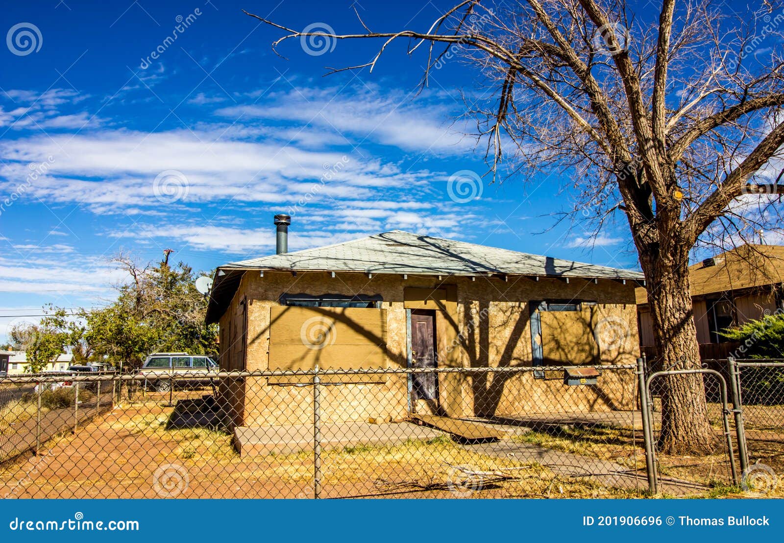 Abandoned One Story Home with Boarded Up Windows Stock Photo - Image of ...