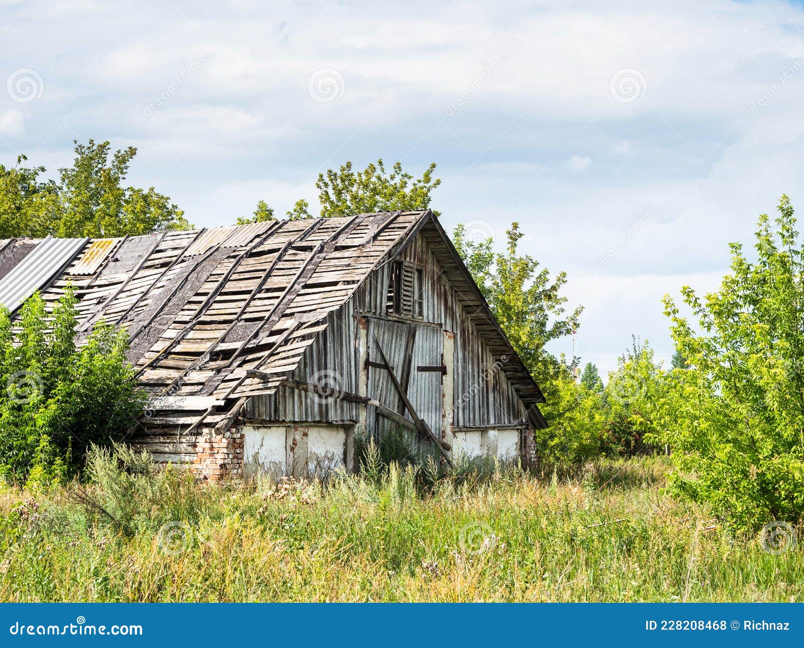 An Abandoned Overgrown Building with a Leaky Roof. an Old Building ...
