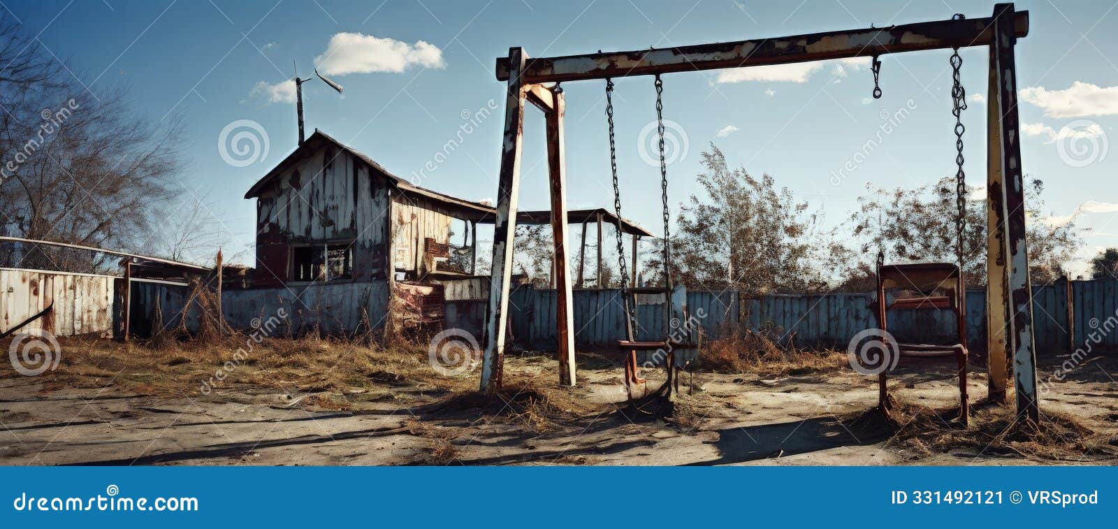 Abandoned Playground with Rusty Swing Set and Dilapidated House Stock ...