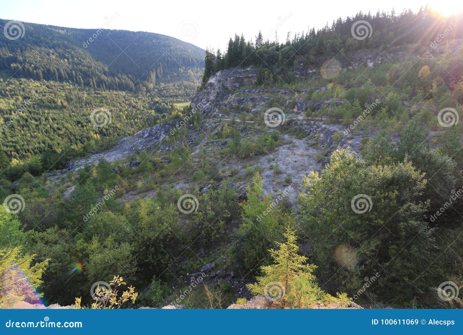 Abandoned Rock Quarry in a Forest at Sunset Stock Image - Image of ...