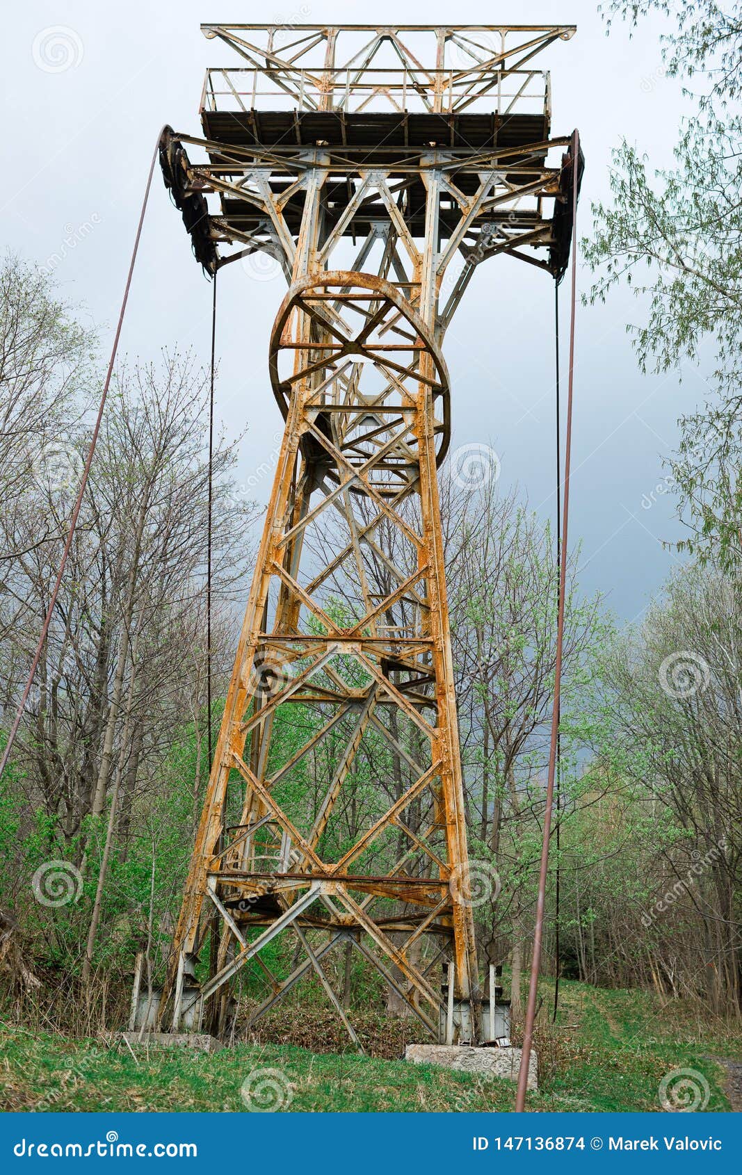 Abandoned Rusty Cable-way Pillar in Forest Stock Photo - Image of blue ...